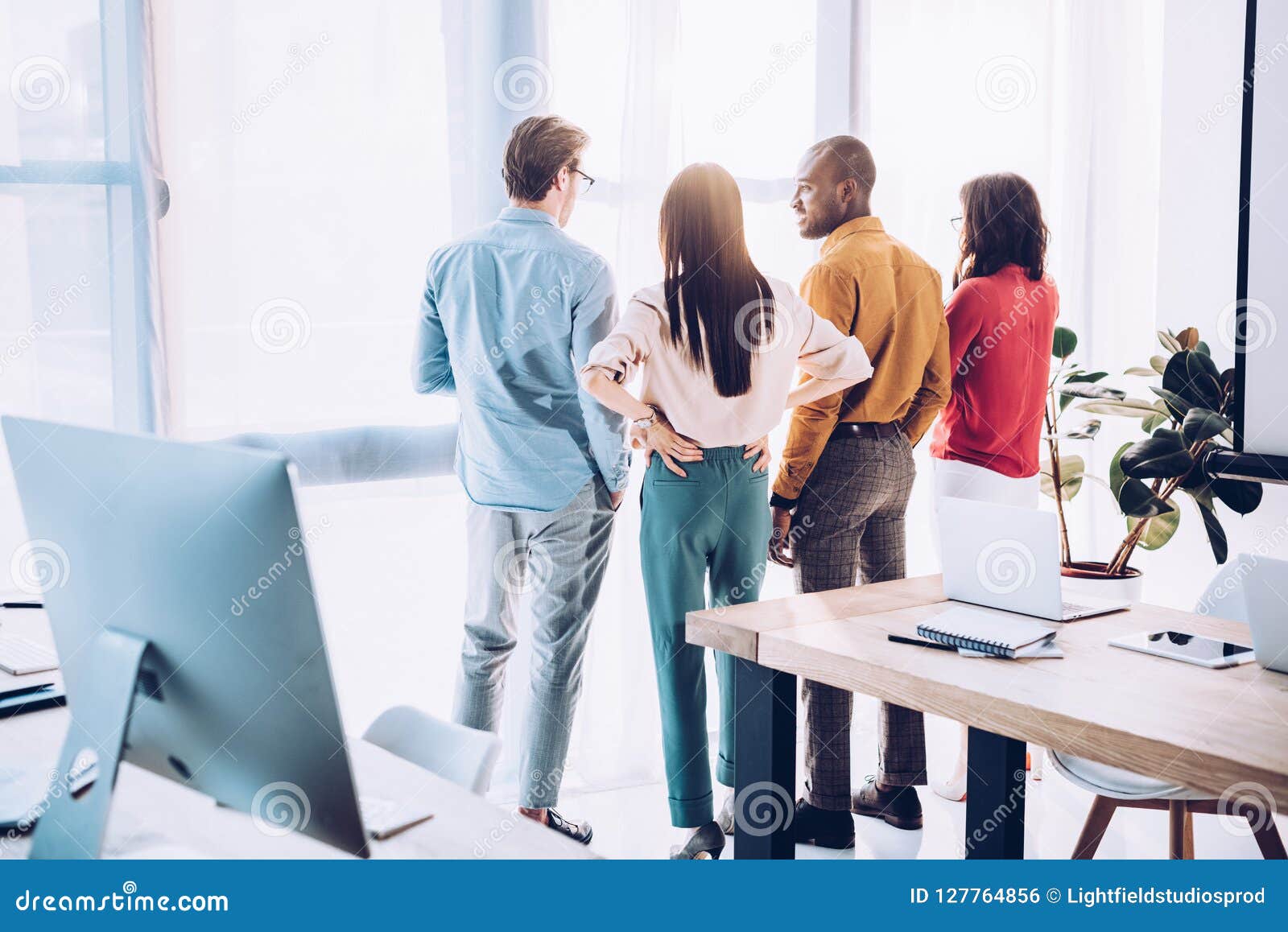 Back View of Multiethnic Business Colleagues Looking Out Window Stock ...