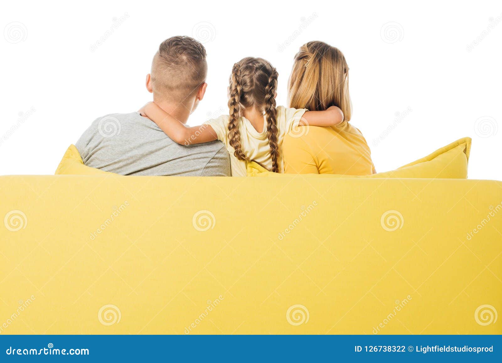 Back View of Parents and Daughter Sitting on Yellow Sofa Stock Photo ...