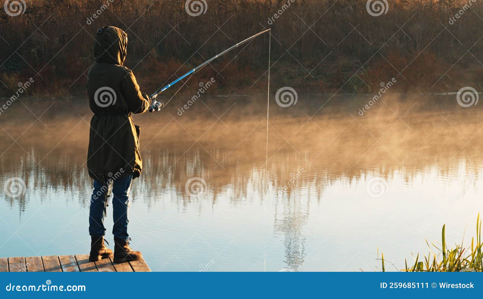 Back View of a Person Fishing in a Lake Stock Image - Image of lake ...