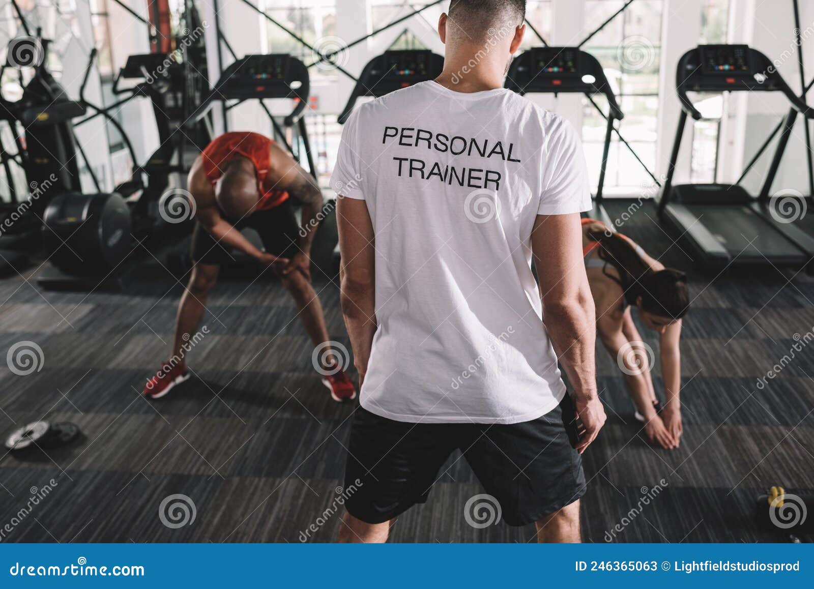 Back View of Personal Trainer Supervising Stock Image - Image of ...