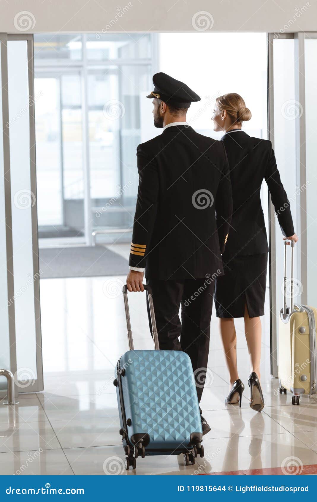 Back View of Pilot and Stewardess Walking Stock Photo - Image of ...