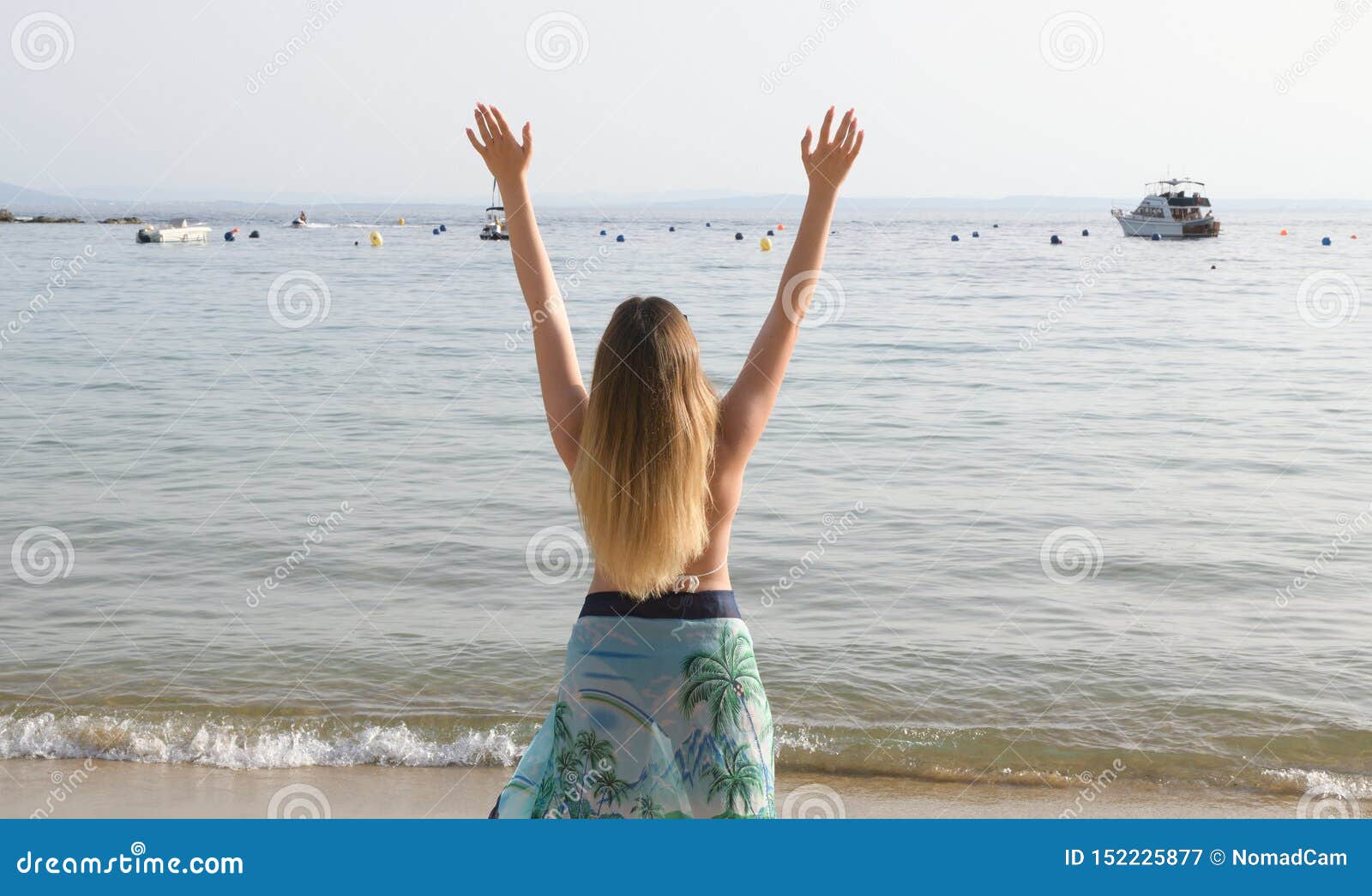 Back View Portrait of a Happy Woman Raising Arms on the Beach Stock ... Back View Portrait of a Happy Woman Raising Arms on the Beach Stock ...