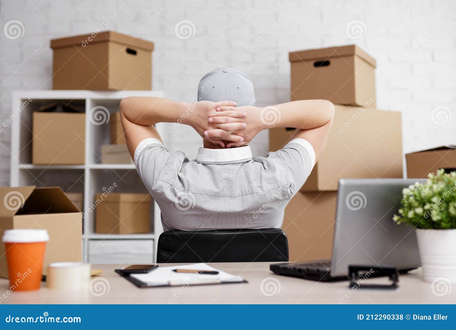 Back View of Postman Resting in Office Stock Photo - Image of indoor ...