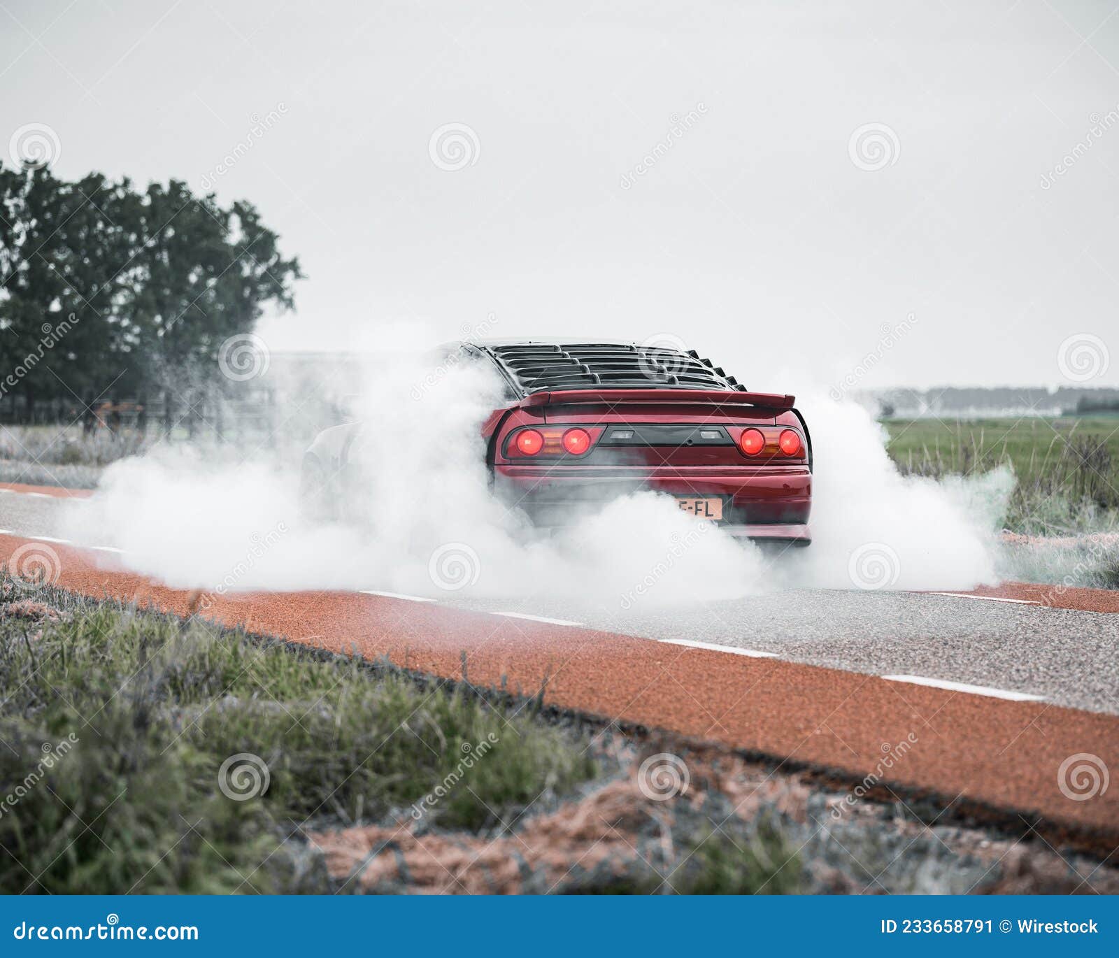 Back view of a red car stock image. Image of transportation - 233658791