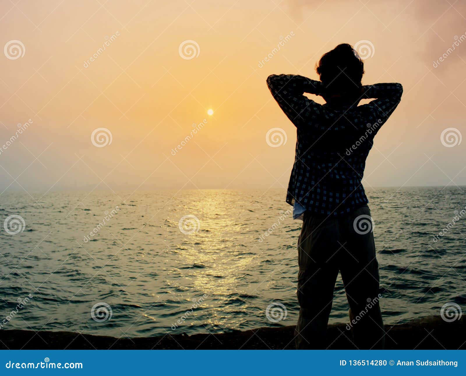 Back View of Relaxed Young Asian Man Standing with Sunset Background ...