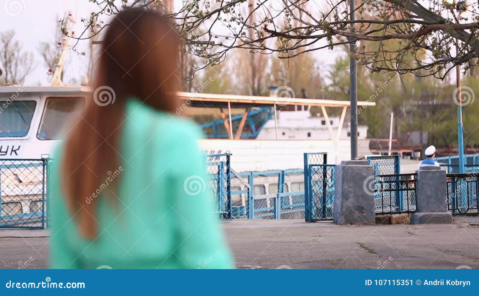 The Back View of the Sad Girl Seeing Off the Boat Captain. Stock Video ...