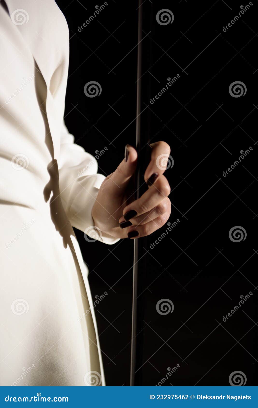 Back View of a Singer with Microphone Singing a Song on Stage in White ...