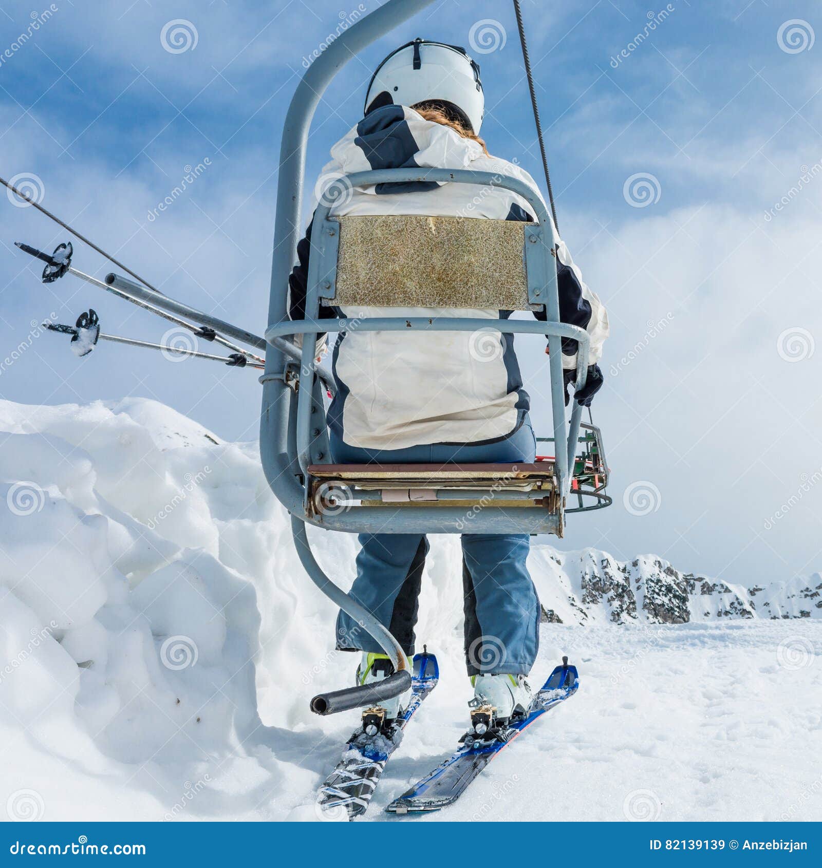 Back View of Skier Riding a Lift. Stock Image - Image of lifestyle ...