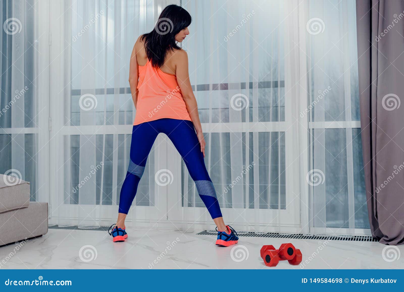 Slim brunette stretching stock photo. Image of flexibility - 149584698