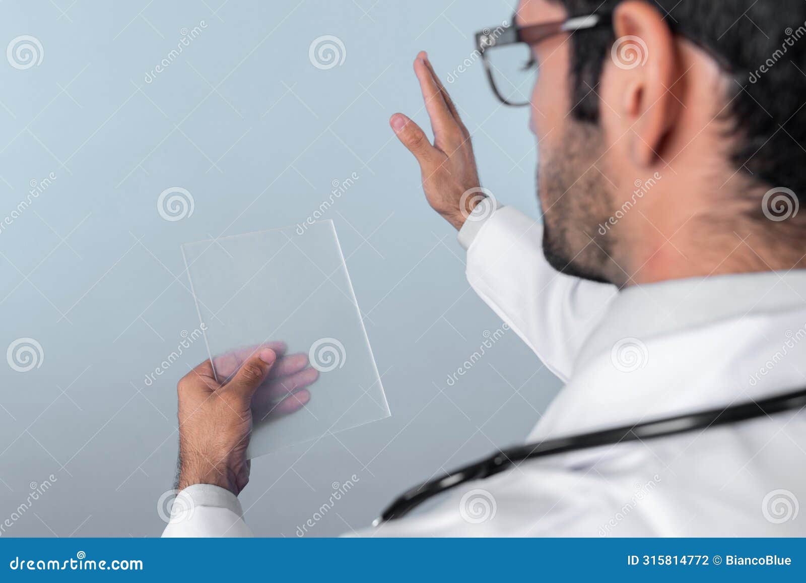 Back View of Smart Doctor Looking Application Form while Standing ...