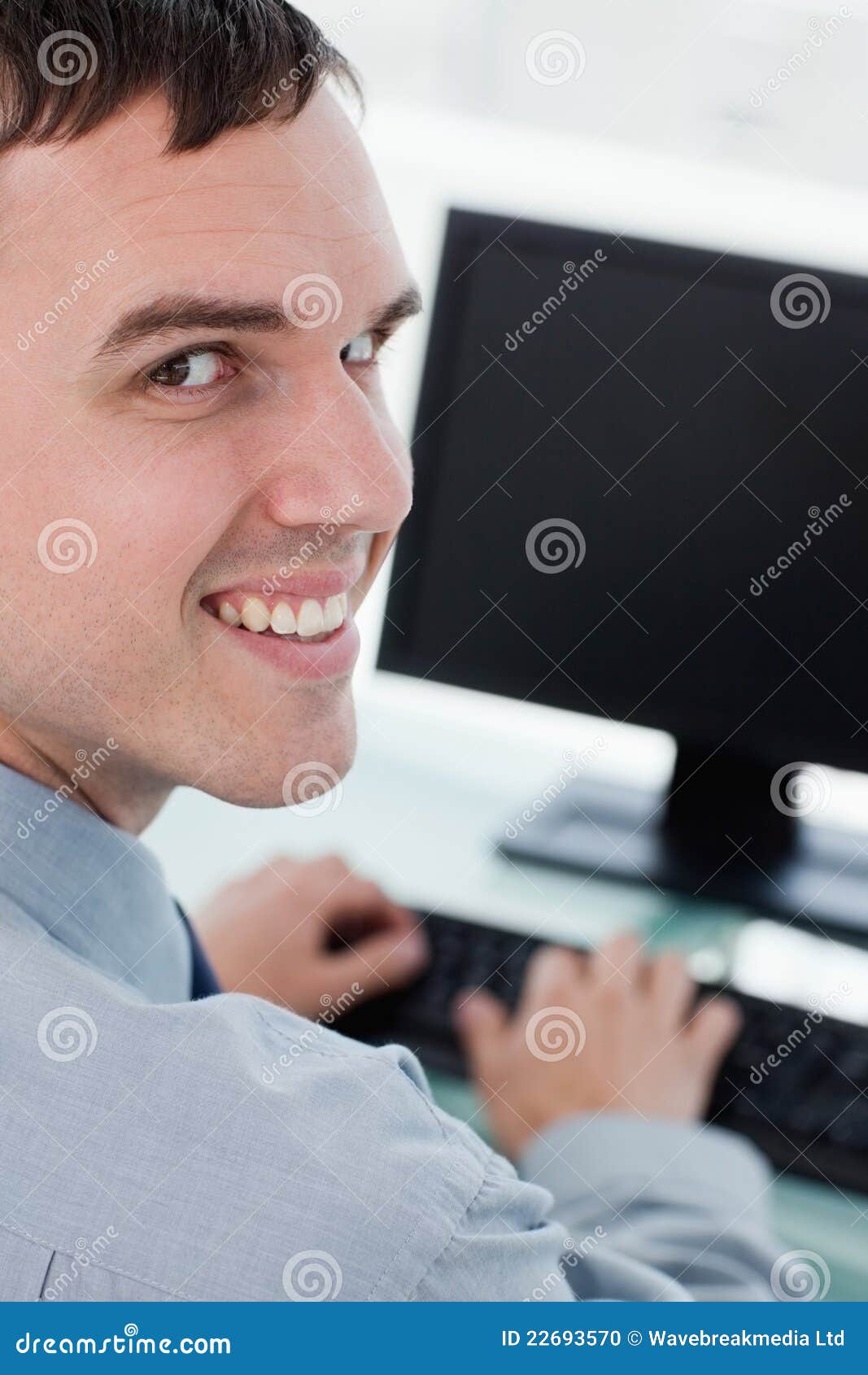Back View of a Smiling Businessman Using a Monitor Stock Photo - Image ...