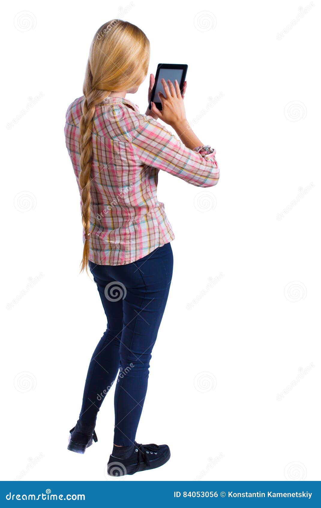 Back View of Standing Young Beautiful Girl with Tablet Computer in the ...