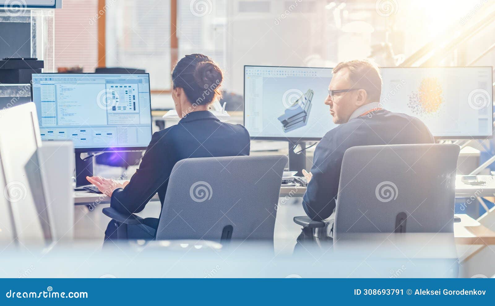 Back View of Team of Technology Engineers Working on Desktop Computers ...