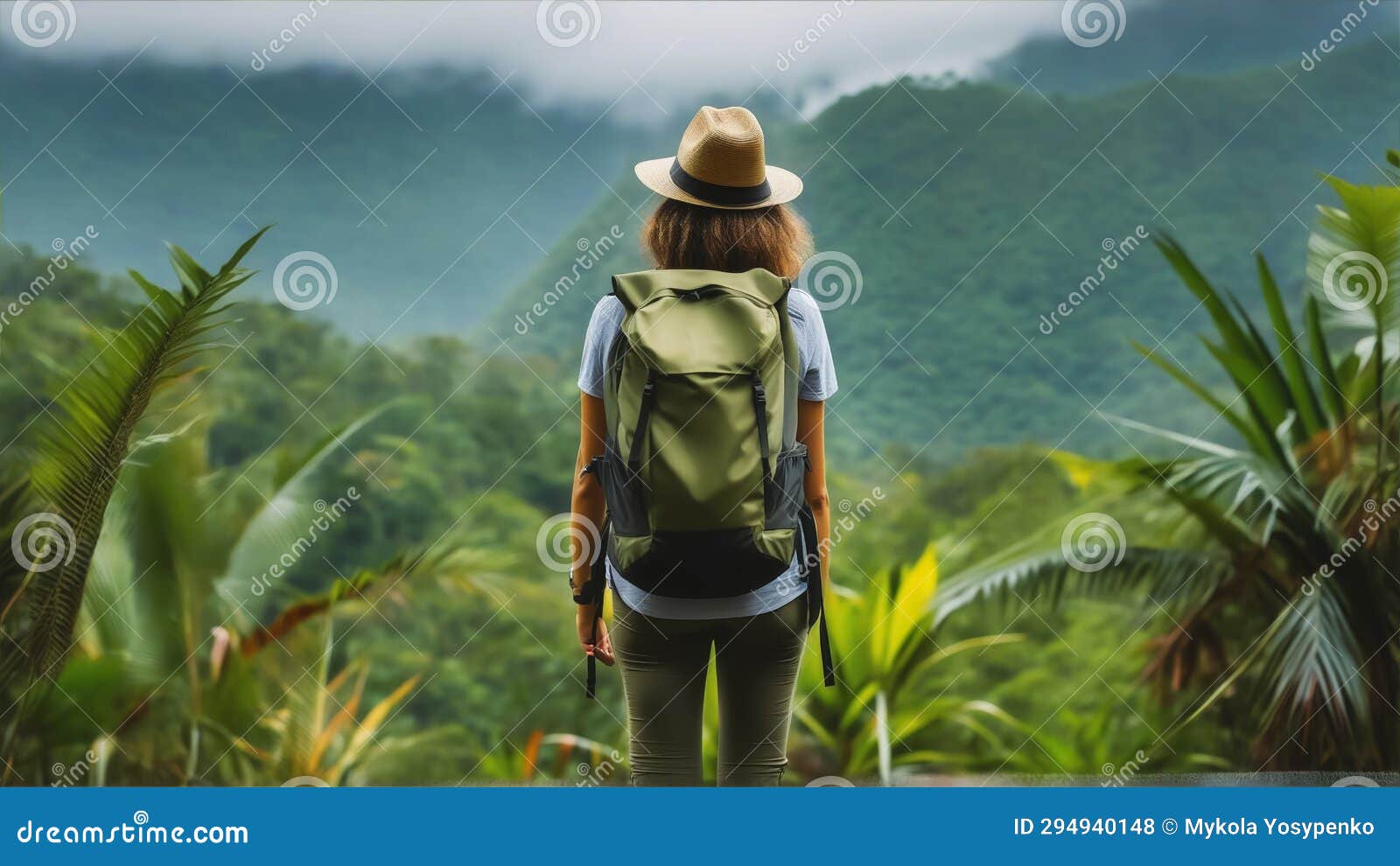 Back View of a Tourist with a Backback, Blurred Distant Rainforest and ...