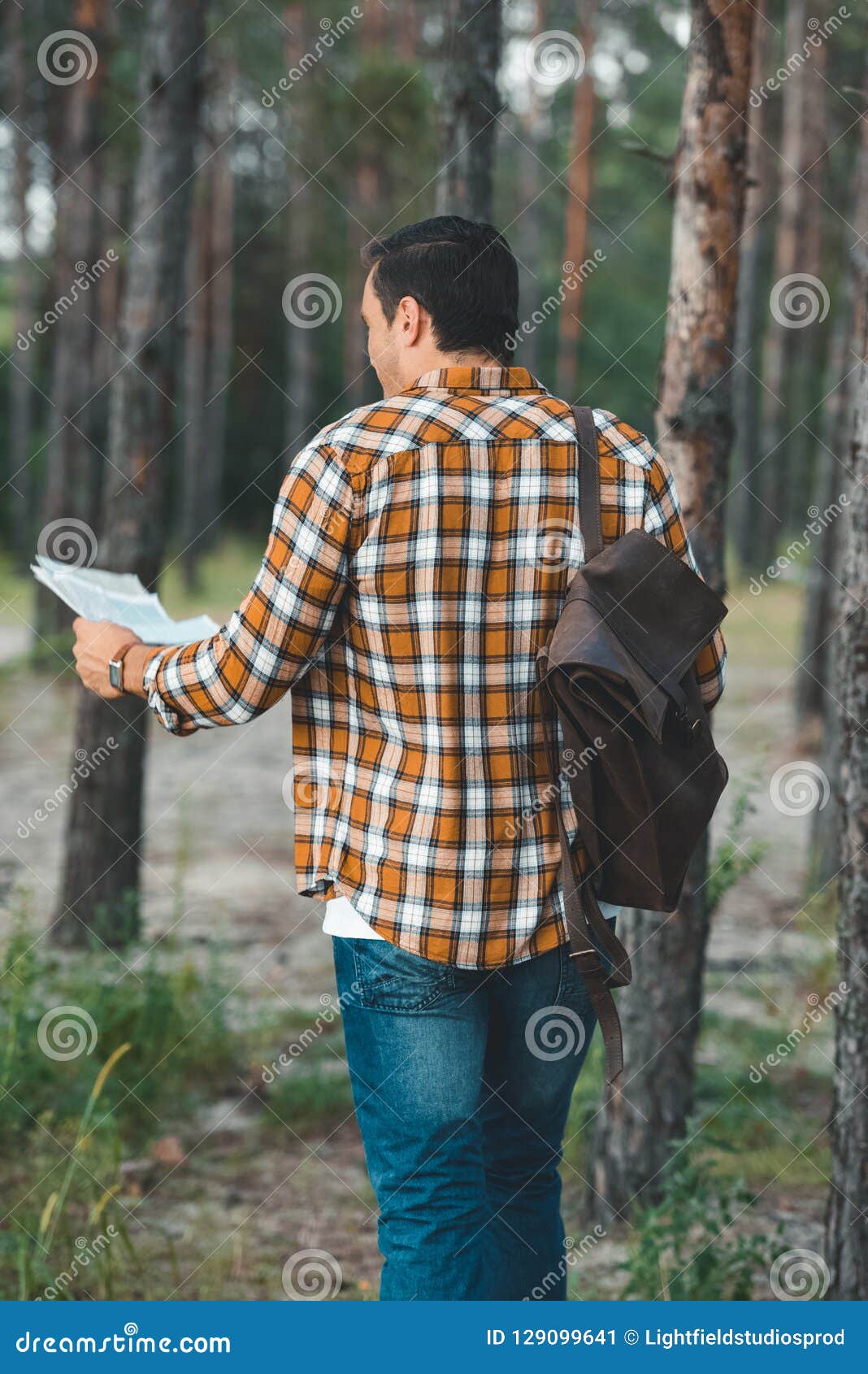 Back View of Tourist with Map and Backpack Stock Image - Image of ...