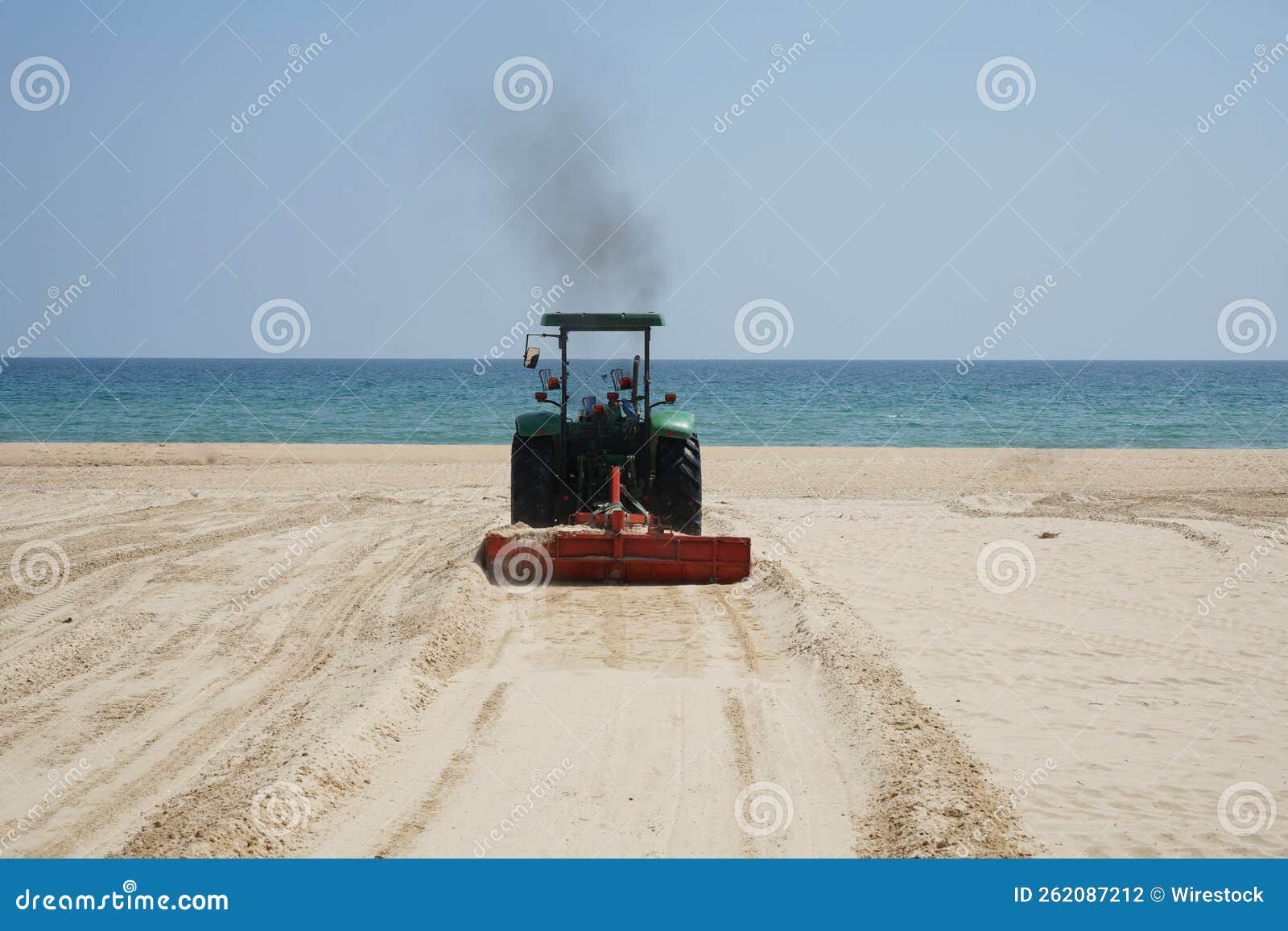 Back View of a Tractor Cleaning on a Sandy Beach Stock Photo - Image of ...