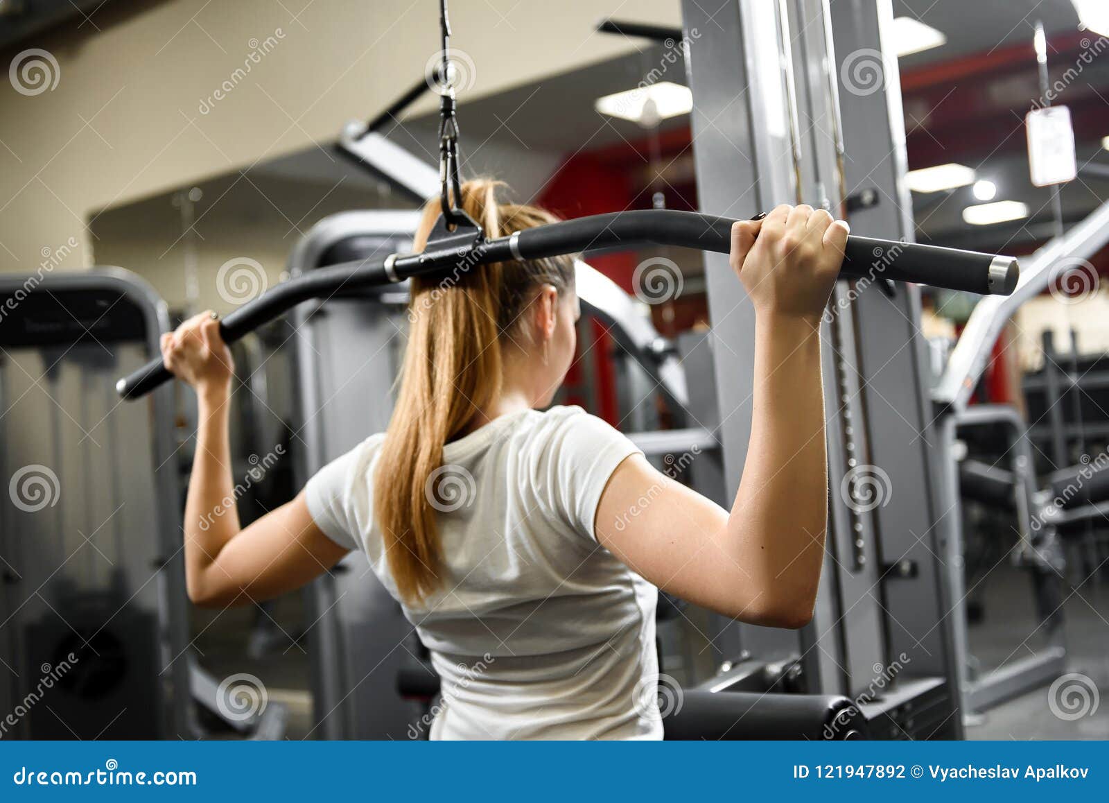 Back View of a Trained Girl Doing Exercises Stock Photo - Image of girl ...