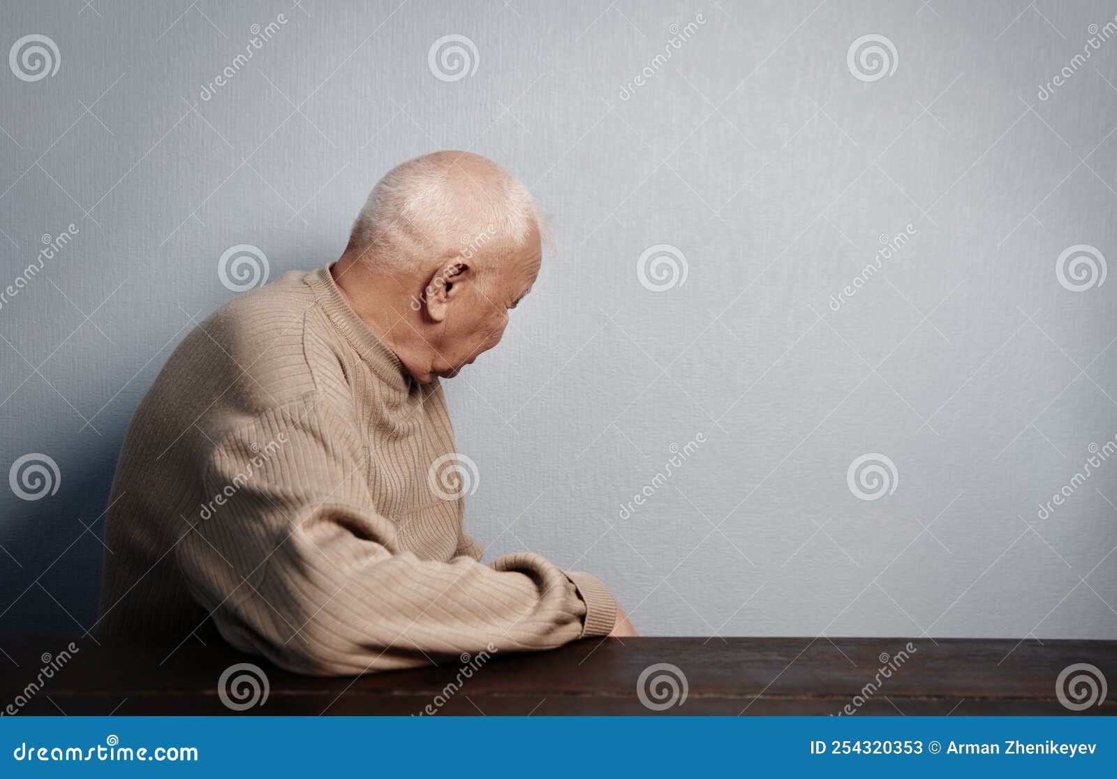 Back View on a Turning Back Senior Man Sitting at the Table Stock Image ...