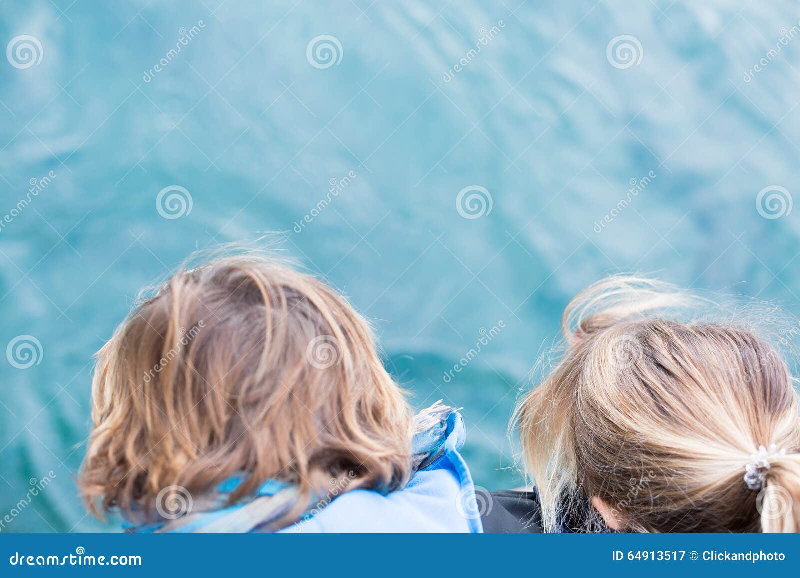 Back View of Two Children Looking Down at Water Stock Image - Image of ...
