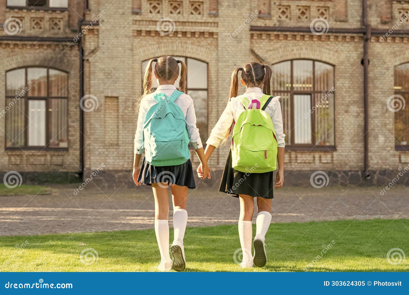 Back View of Two Children with School Backpack Walking Together Outdoor ...