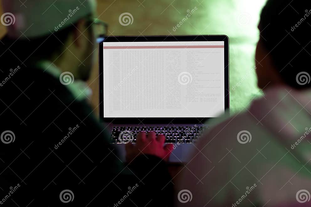 Back View of Two Diverse Male Colleagues Using Laptop with Coding on Screen Stock Photo - Image ...