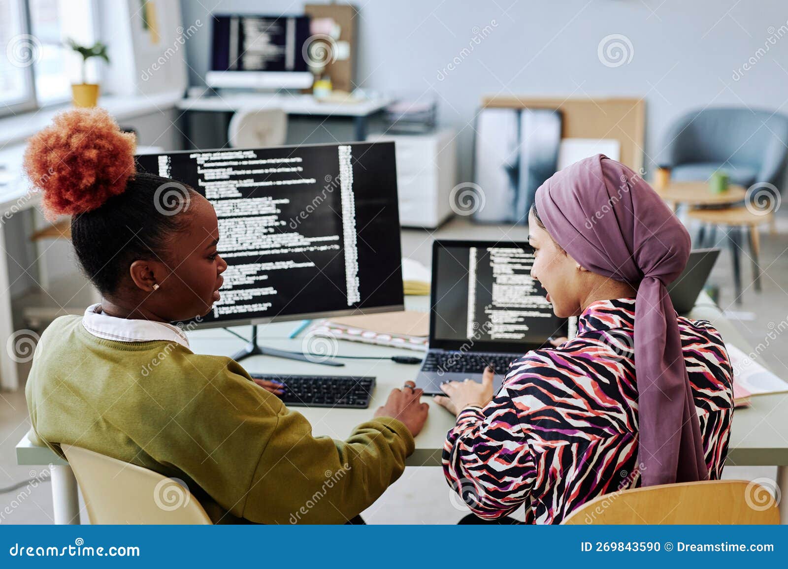 Back View at Two Female Programmers Writing Code Together Stock Photo ... Back View at Two Female Programmers Writing Code Together Stock Photo ...