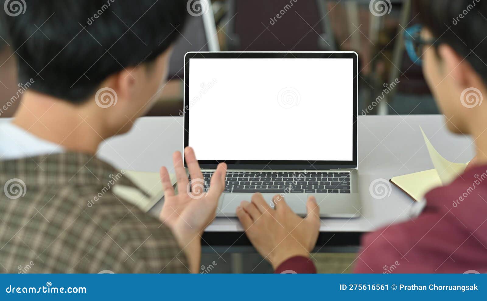 Back View of Two Student Using Laptop, Working Together on Academic ...