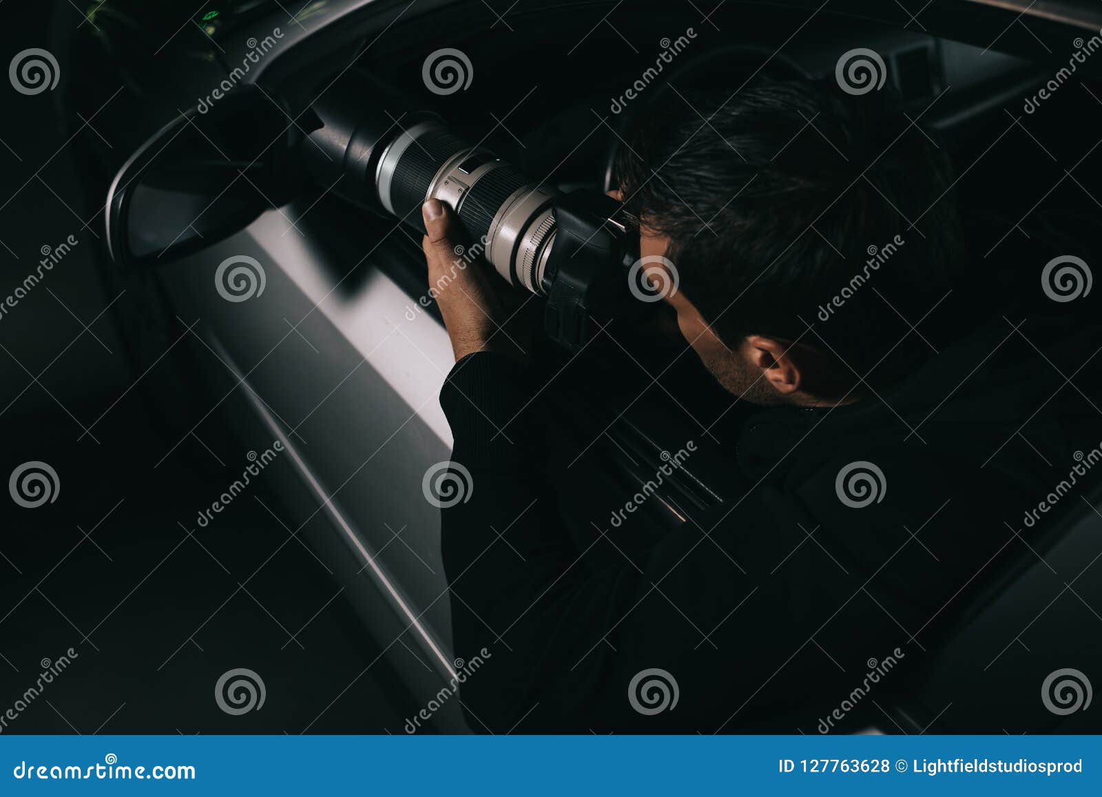 Back View of Undercover Agent Doing Surveillance by Camera with Object ...