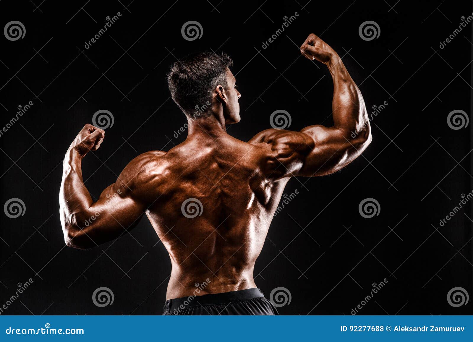 Back View of Unrecognizable Man, Strong Muscles Posing with Arms Up ...