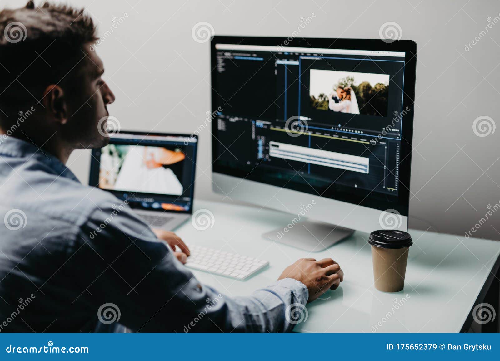 Back View of Video Editor Using Computer Working with Fotoage at His ...