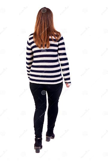 Back View Of Walking Woman Beautiful Blonde Girl In Motion Stock