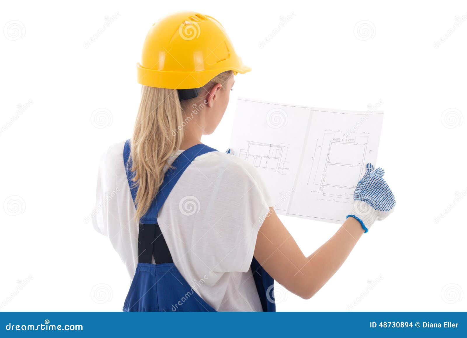 Back View of Woman in Blue Builder Uniform Holding Building Project ...