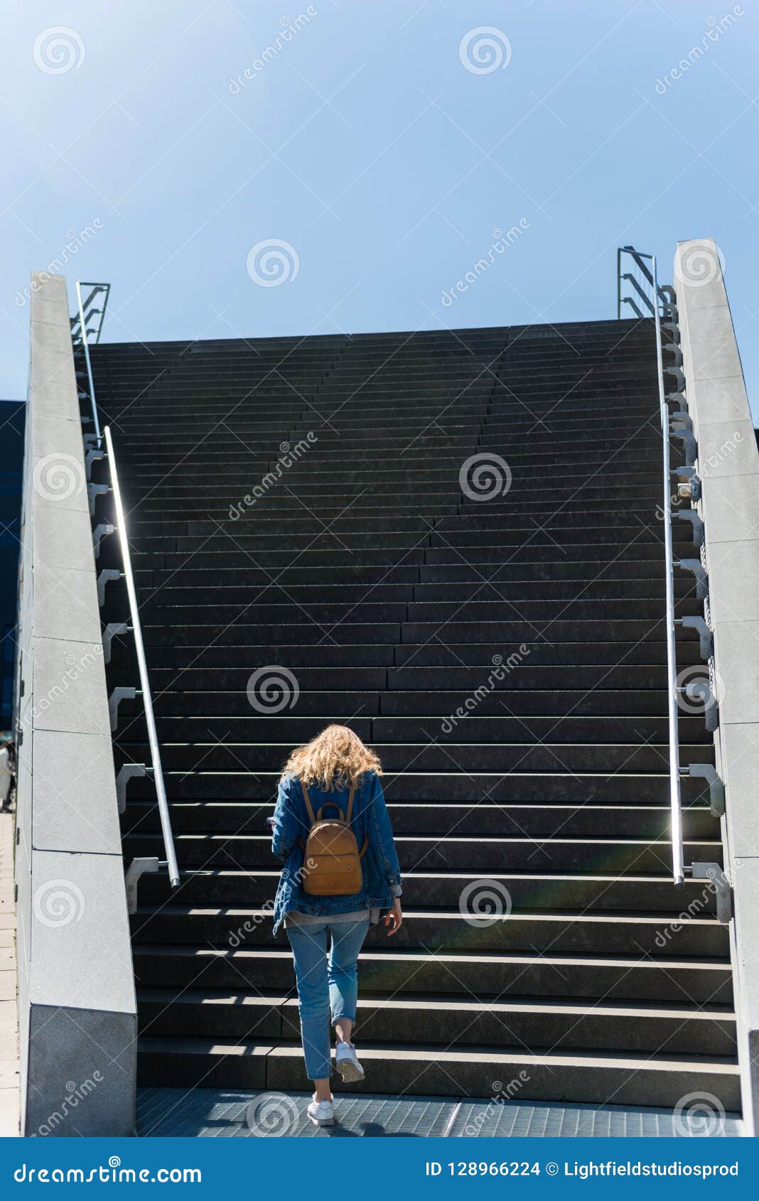Back View of Woman Going Up on Steps Stock Photo - Image of backpacker ...