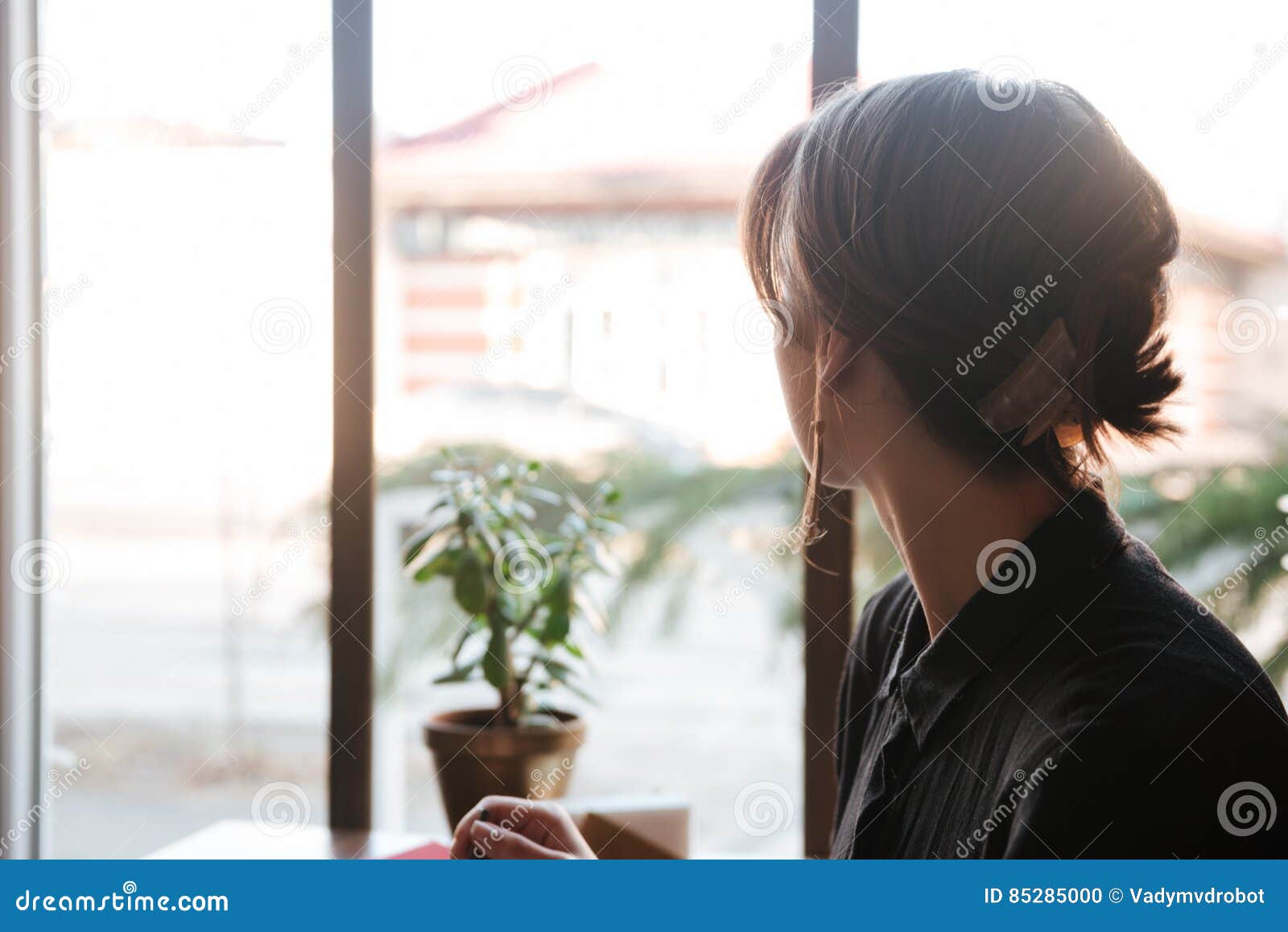 Back View of Woman Sitting at the Table in Cafe Stock Photo - Image of ...