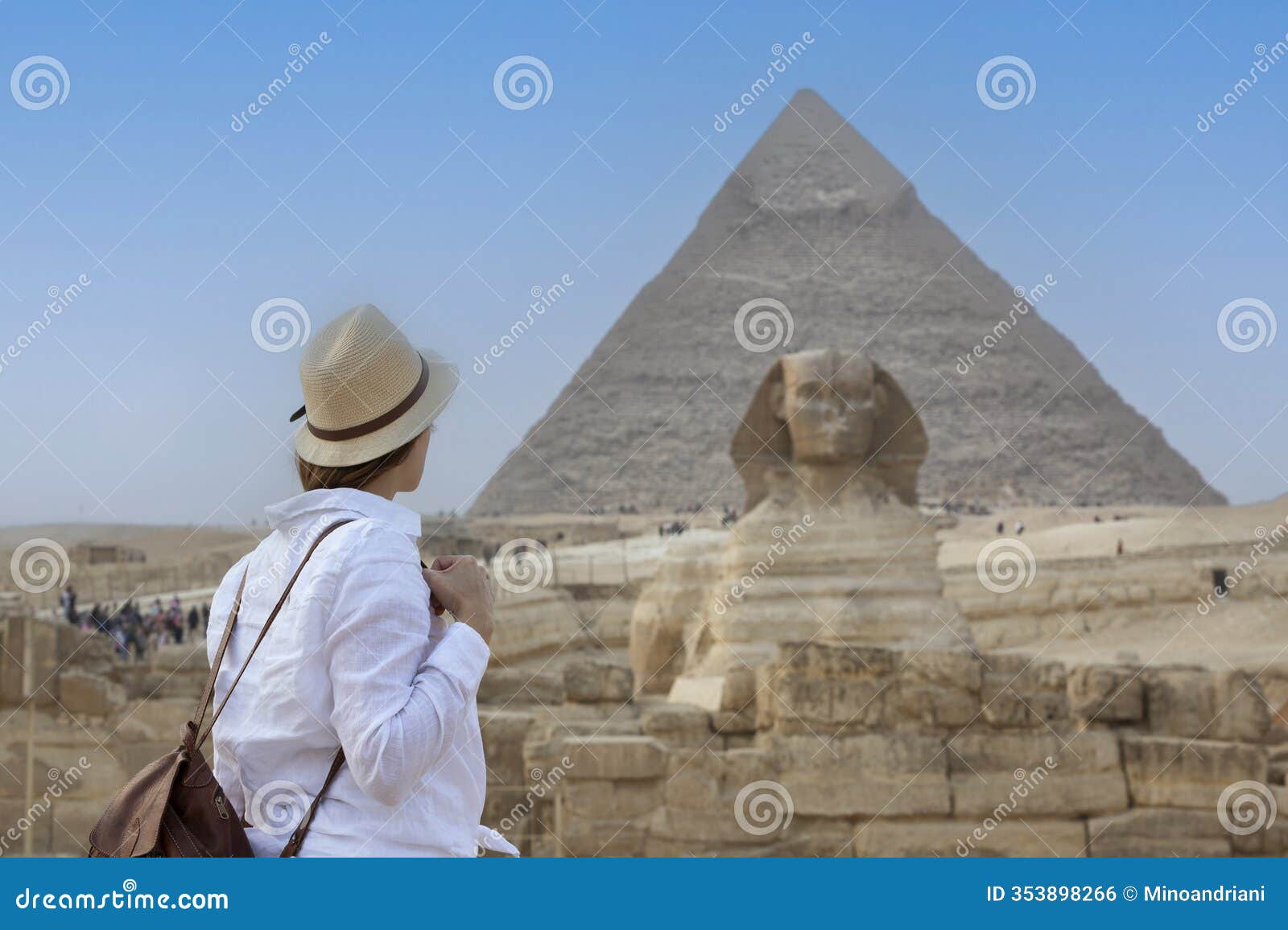 Back View of a Woman Wearing a Hat, Looking at the Great Pyramids in ...