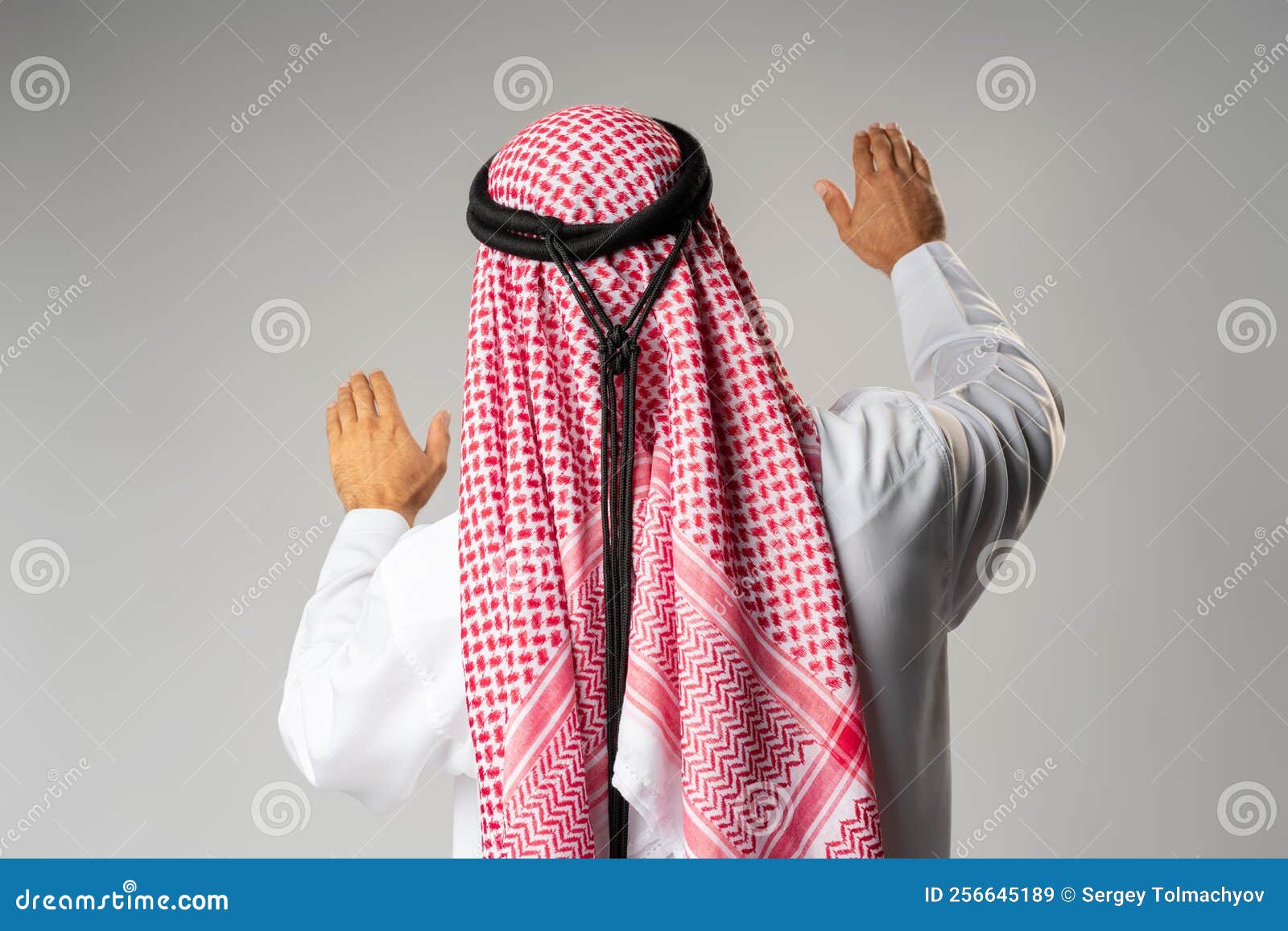 Back View of Young Arab Man Standing on Gray Background Stock Image ...