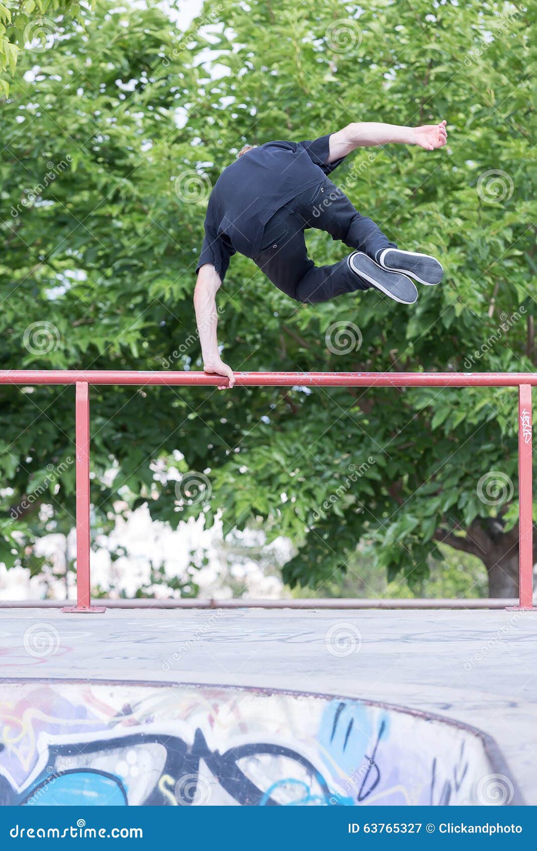 Back View of Young Athlete Jumping Stock Image - Image of stunt, person ...