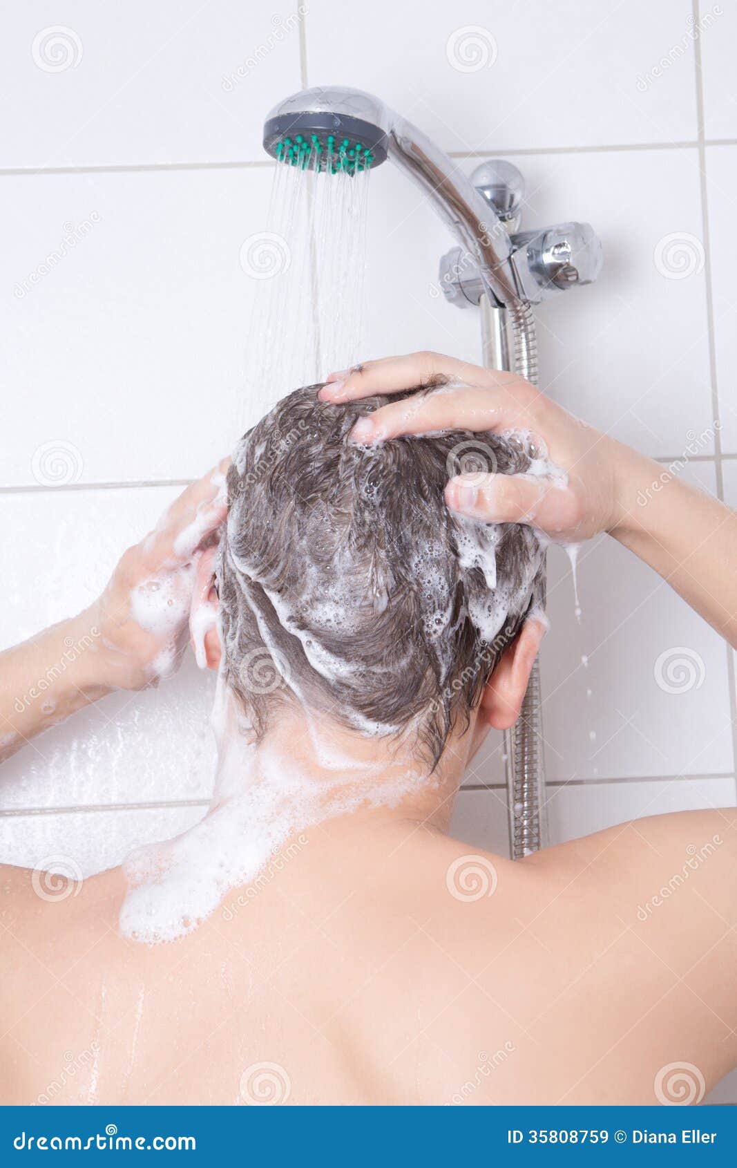 Back View Of Young Attractive Man Washing Hair With Shampoo Stock Image