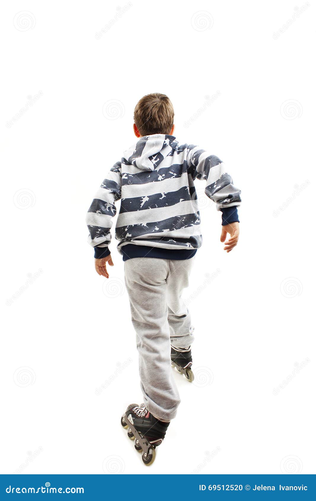 Back View Young Boy on Rollers. Rear View Stock Photo - Image of ...