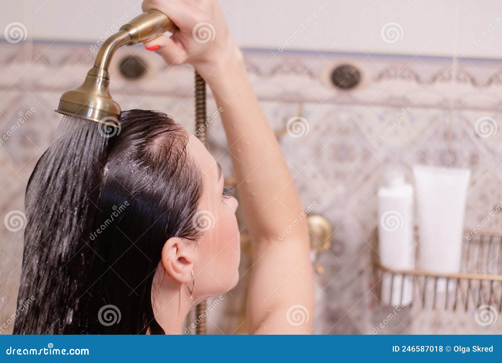 Back View Of Young Brunette Woman Taking Shower In Bathroom Washing