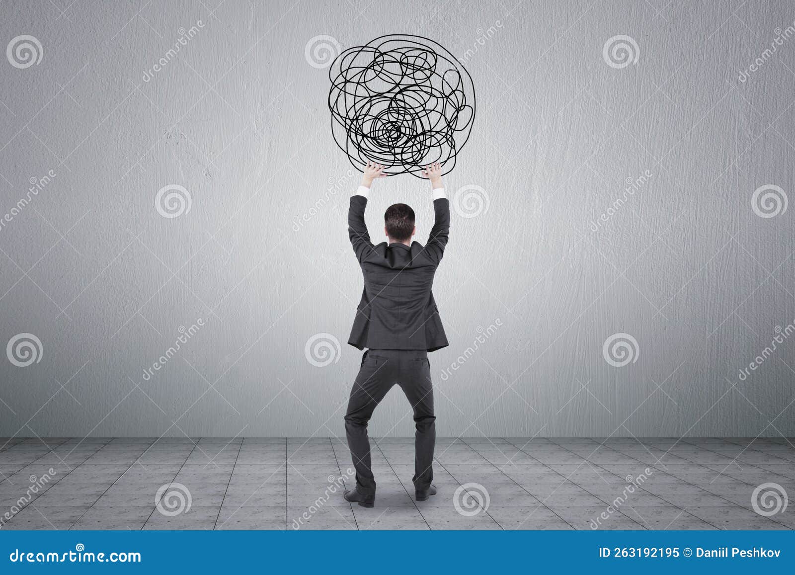 Back View of Businessman Holding Scribble of Thoughts on Concrete Wall ...