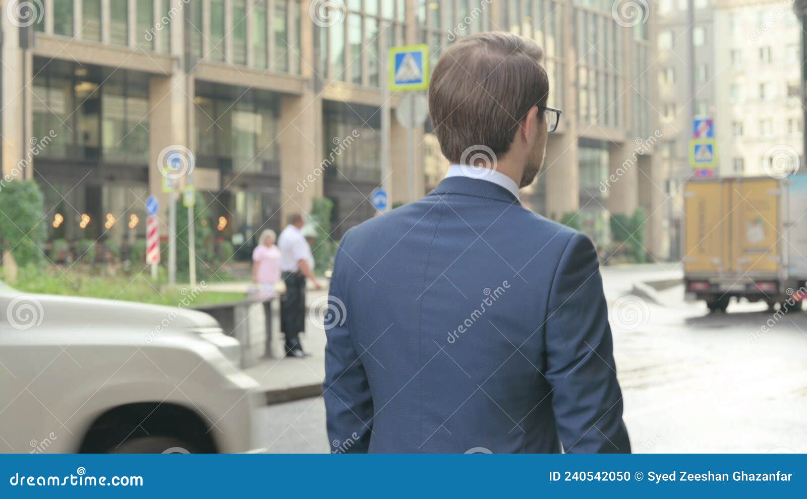 Back View of Young Businessman Walking on Street Stock Photo - Image of ...