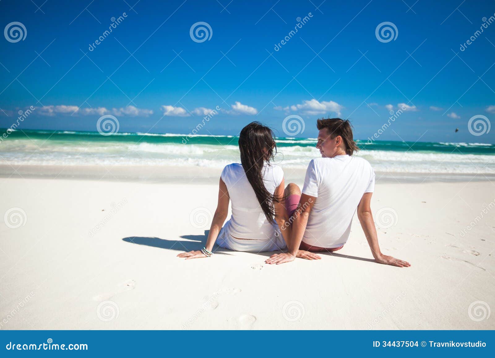 Back View of Young Couple in Love Sitting at Stock Photo - Image of ...