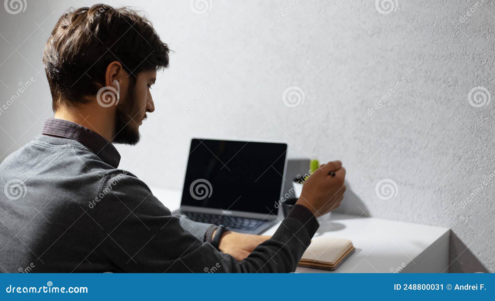 Back View of Young Guy Working Online at Home. Stock Image - Image of ...