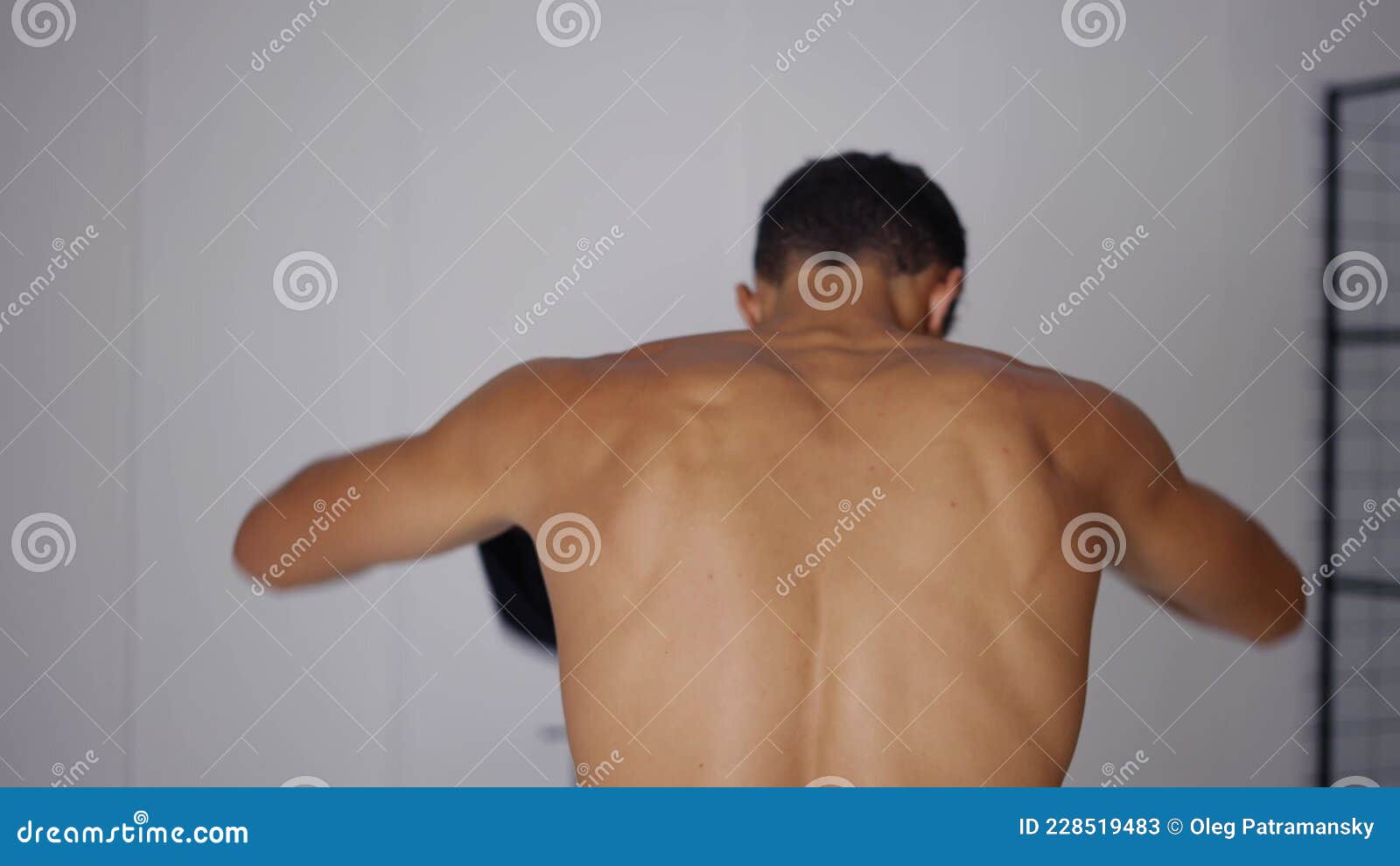 Back View of a Young Male Taking His Shirt Off Stock Video - Video of ...