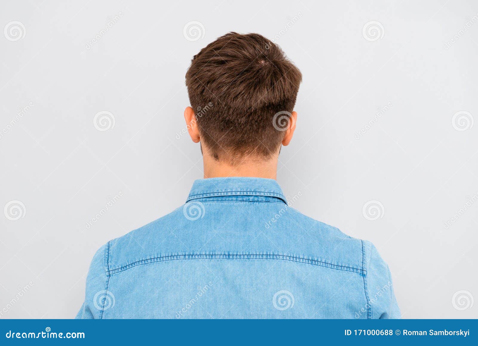 Back View of Young Man Isolated on Gray Background Stock Photo - Image ...