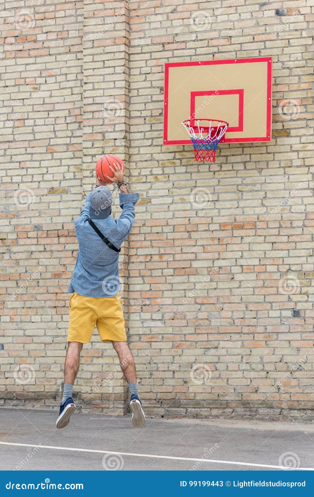 Young Man Playing Basketball Alone Stock Image - Image of sport, people ...