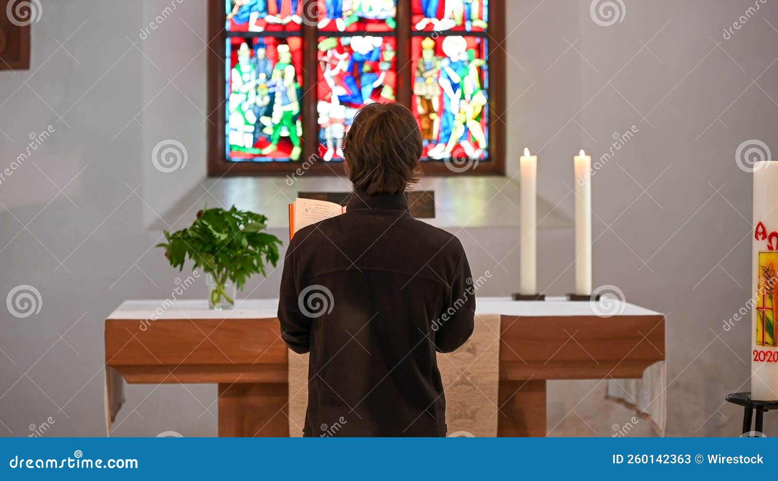 Back View of a Young Man Praying at the Altar in a Church Stock Image ...