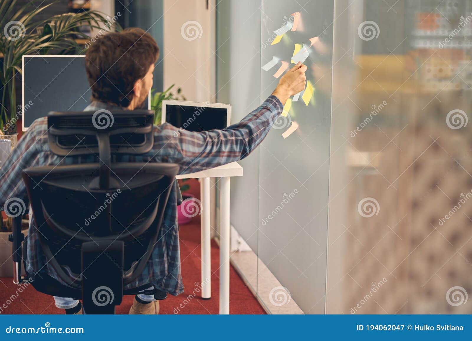 Male Worker Using Sticky Notes in Office Stock Image - Image of gadget ...