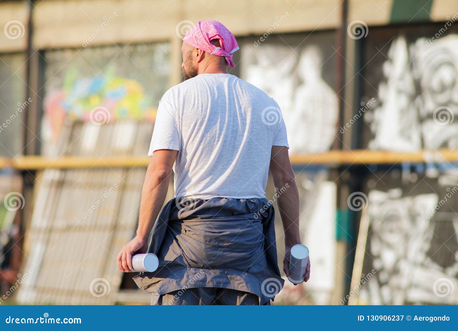 Back View of a Young Man Spray Paint Artist Stock Image - Image of ...